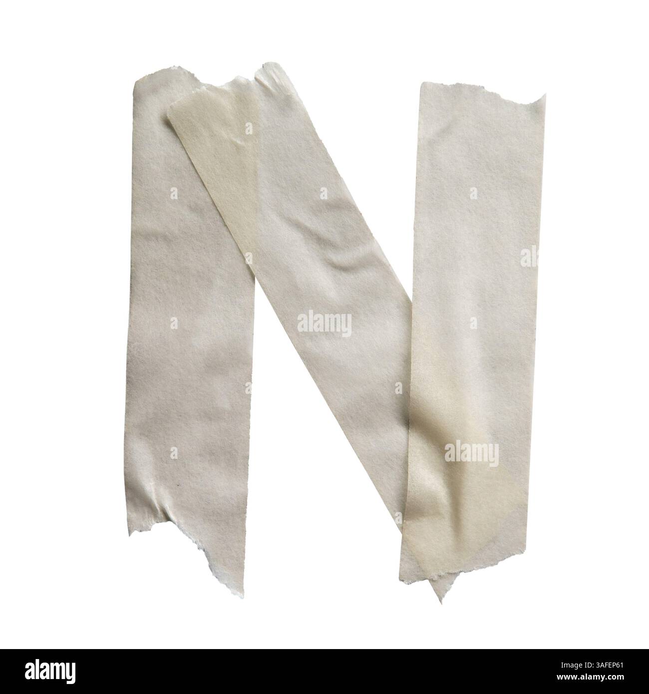 Letter N made of off-white color masking tape on white background with ...