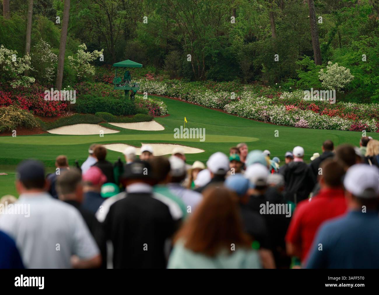 Augusta, United States. 07th Apr, 2025. Patrons tour the 12th hole and ...
