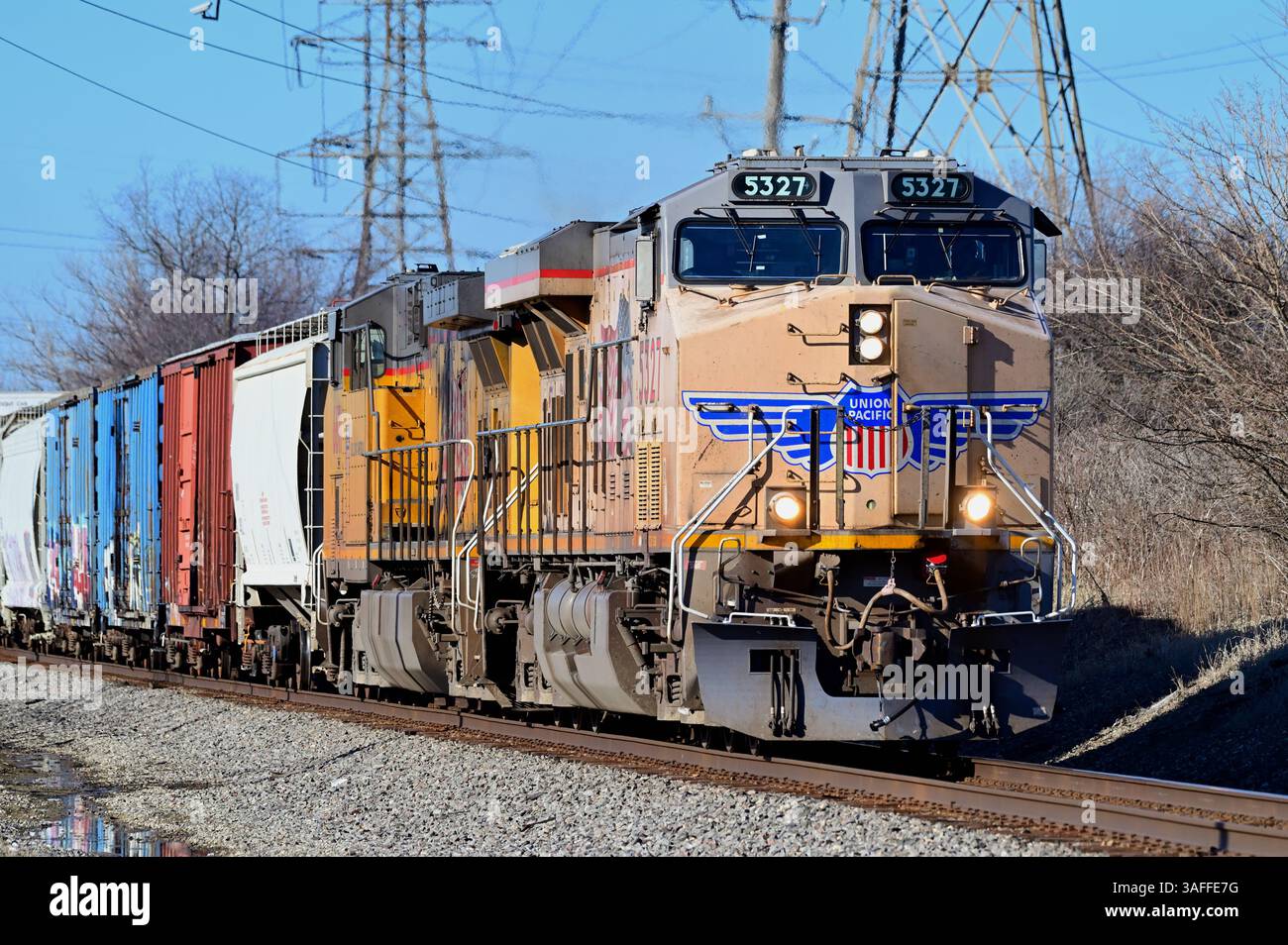 Naperville, Illinois, USA. Two Union Pacific Railroad locomotives lead a southbound freight ...