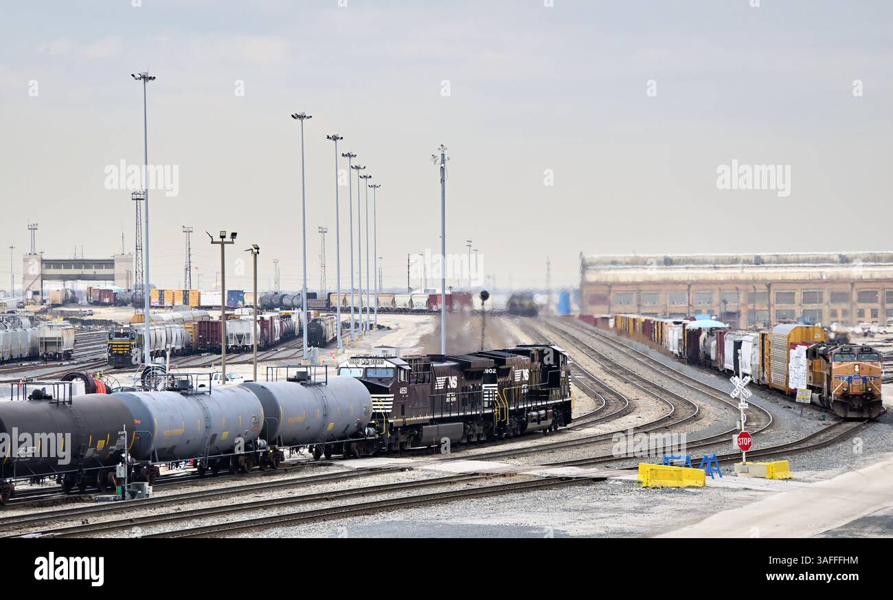 Bedford Park, Illinois, USA. A pair of Norfolk Southern Railway locomotives lead a train into ...