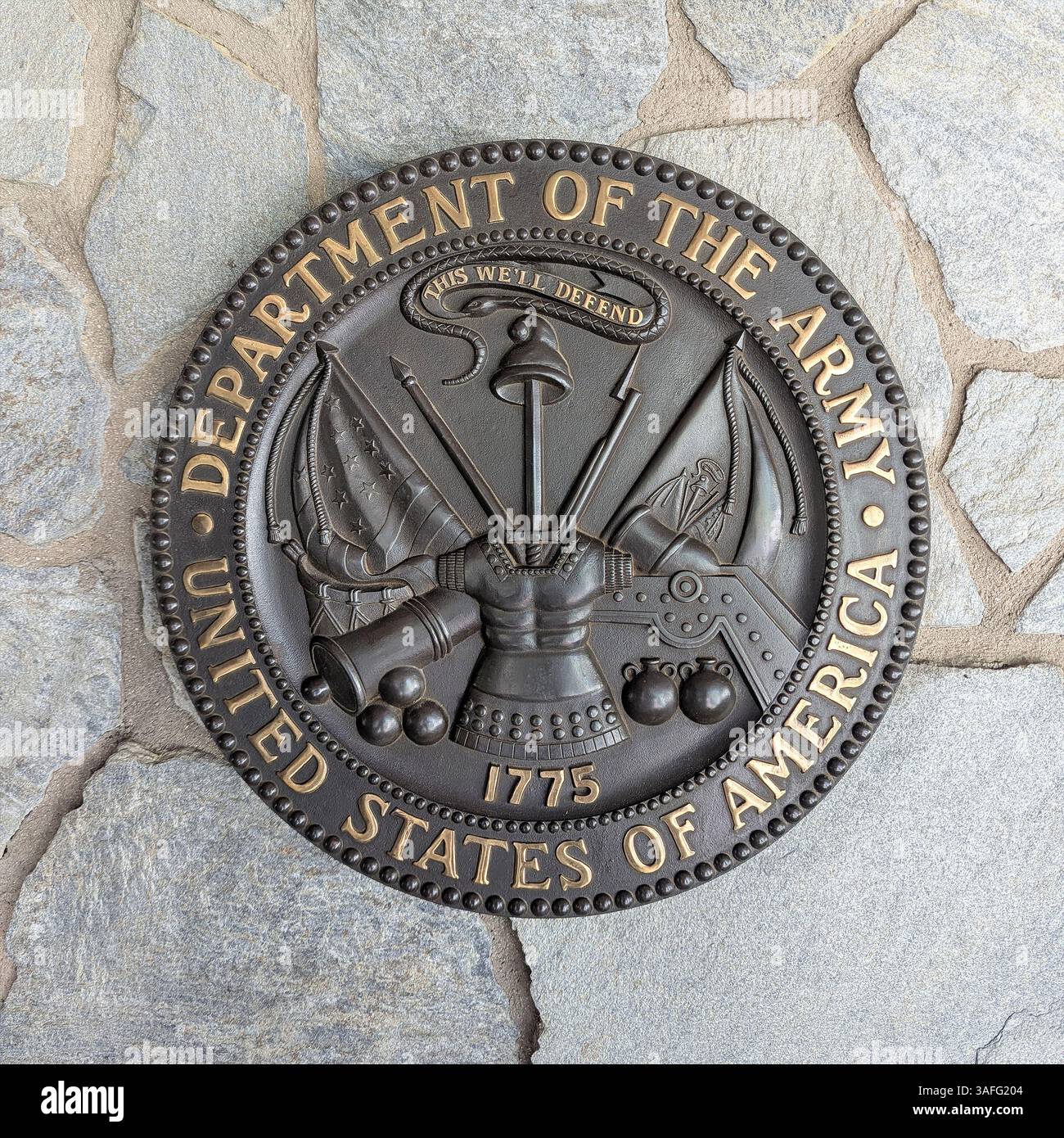 Bronze plaque of US Army emblem or crest on natural stone wall Stock ...