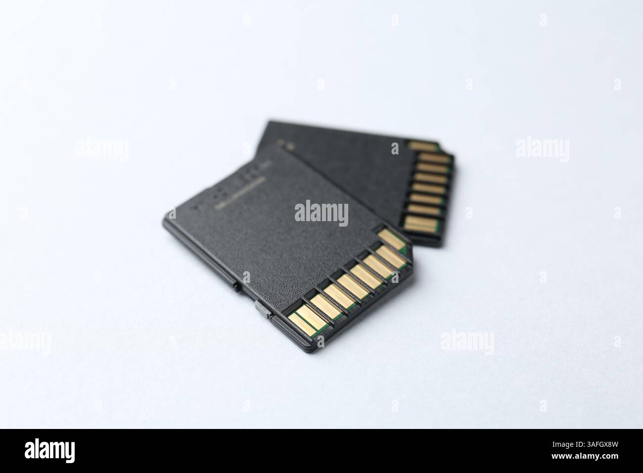 Two SD memory cards on white background, closeup Stock Photo - Alamy