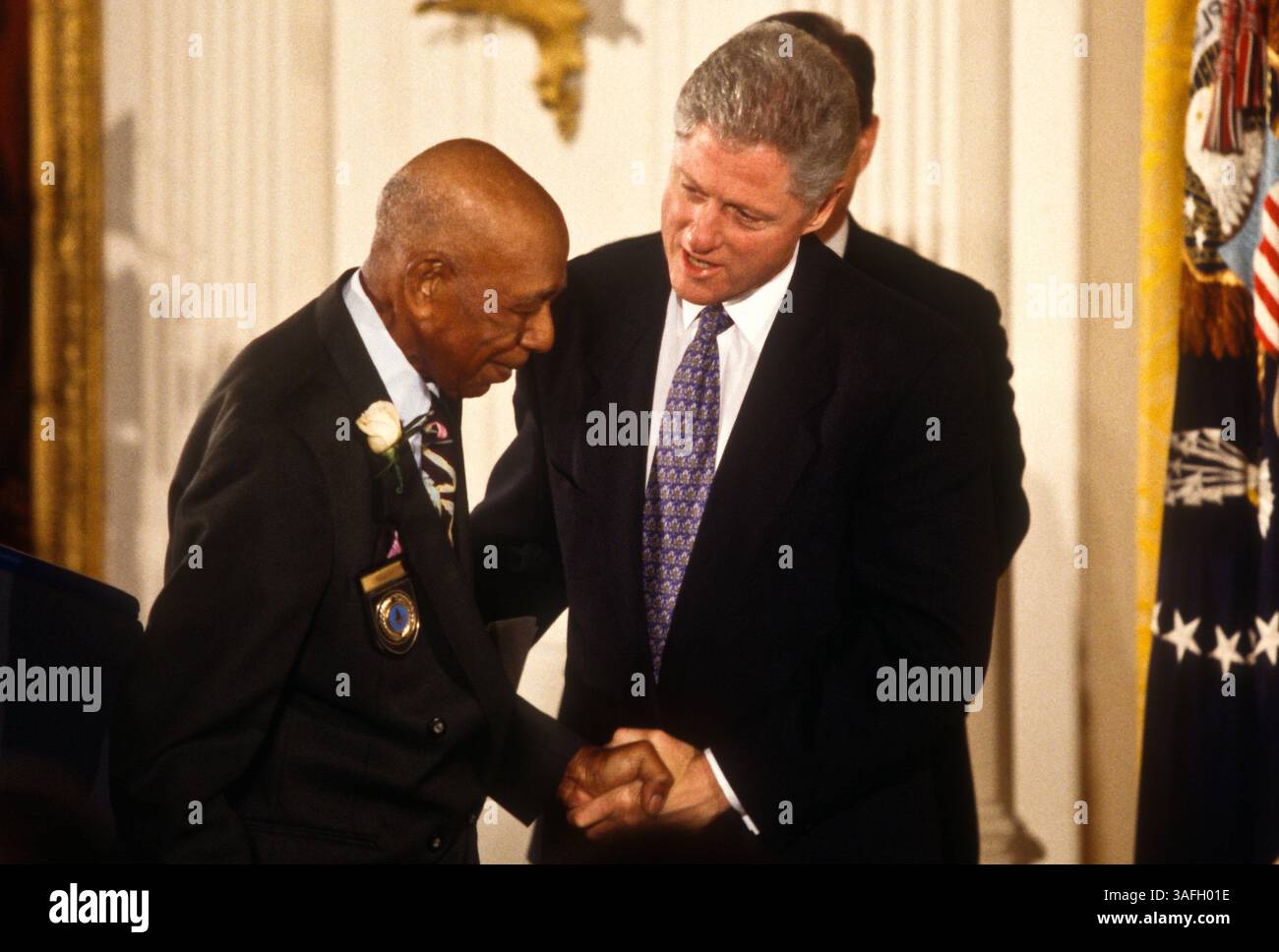 May 16, 1997 - Washington, Dc, DC, USA - President Bill Clinton assists ...