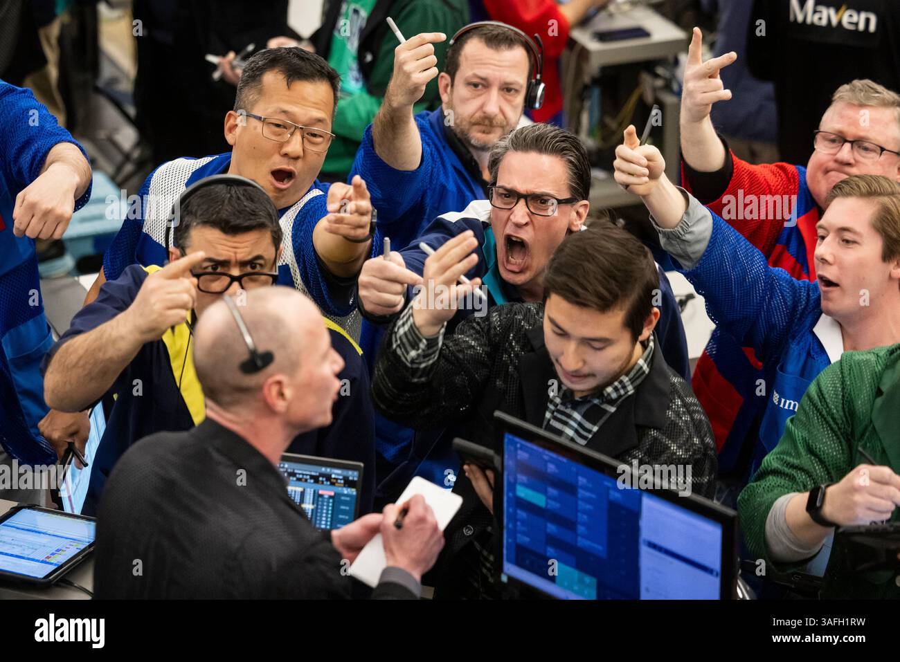 Traders work in the S&P options pit at the Cboe Options Exchange in the ...