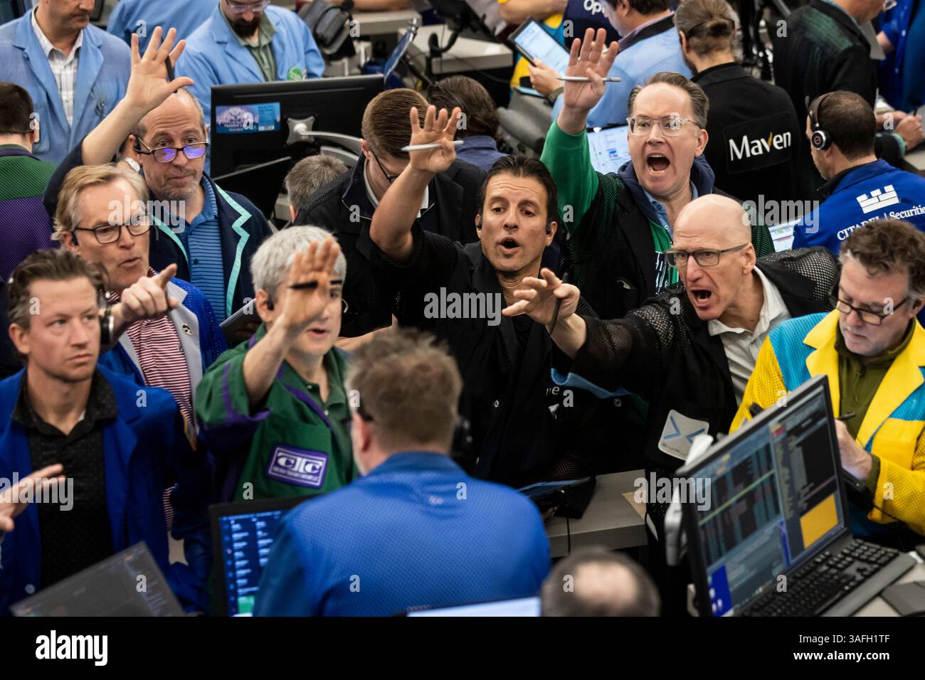 Traders work in the S&P options pit at the Cboe Options Exchange in the ...