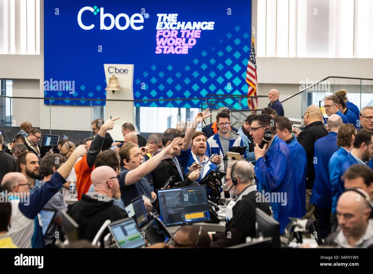 Traders work in the S&P options pit at the Cboe Options Exchange in the ...