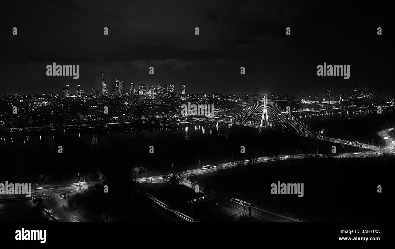 The golden pulse of Warsaw at night—glowing roads, towering skyscrapers ...