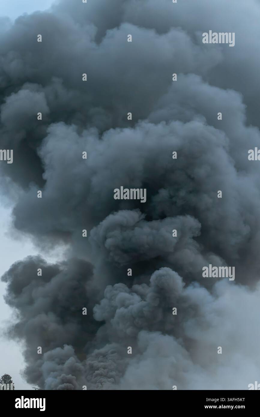 Thick smoke flames rise hi-res stock photography and images - Alamy