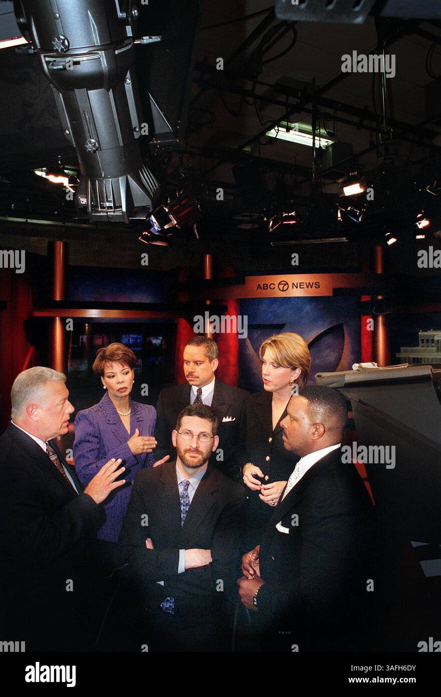 Back row left to right, chief meteorologist Doug Hill, anchors Maureen ...