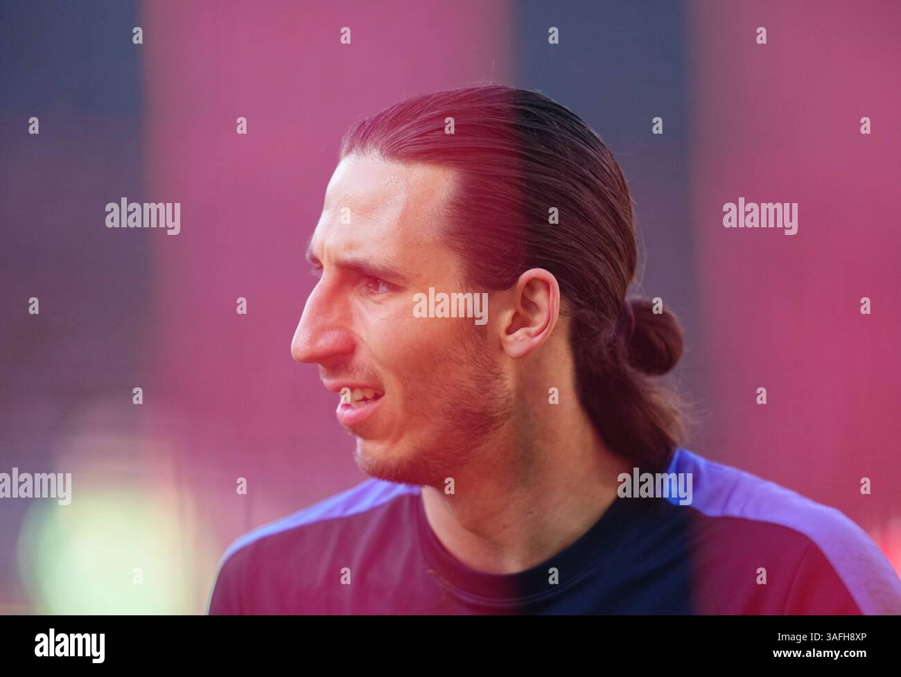 April 06 2025: Kamil Grabara of VfL Wolfsburg looks on during a 1 ...