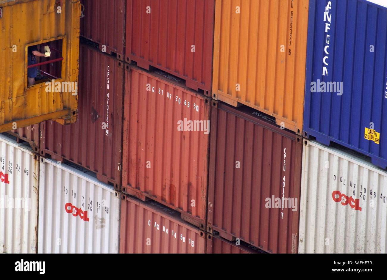 Crane moves containers onto hi-res stock photography and images - Alamy
