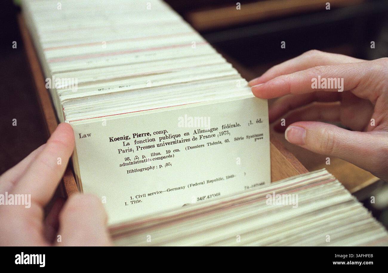 Researcher Jane Blevins looks through the old card catalog in the ...
