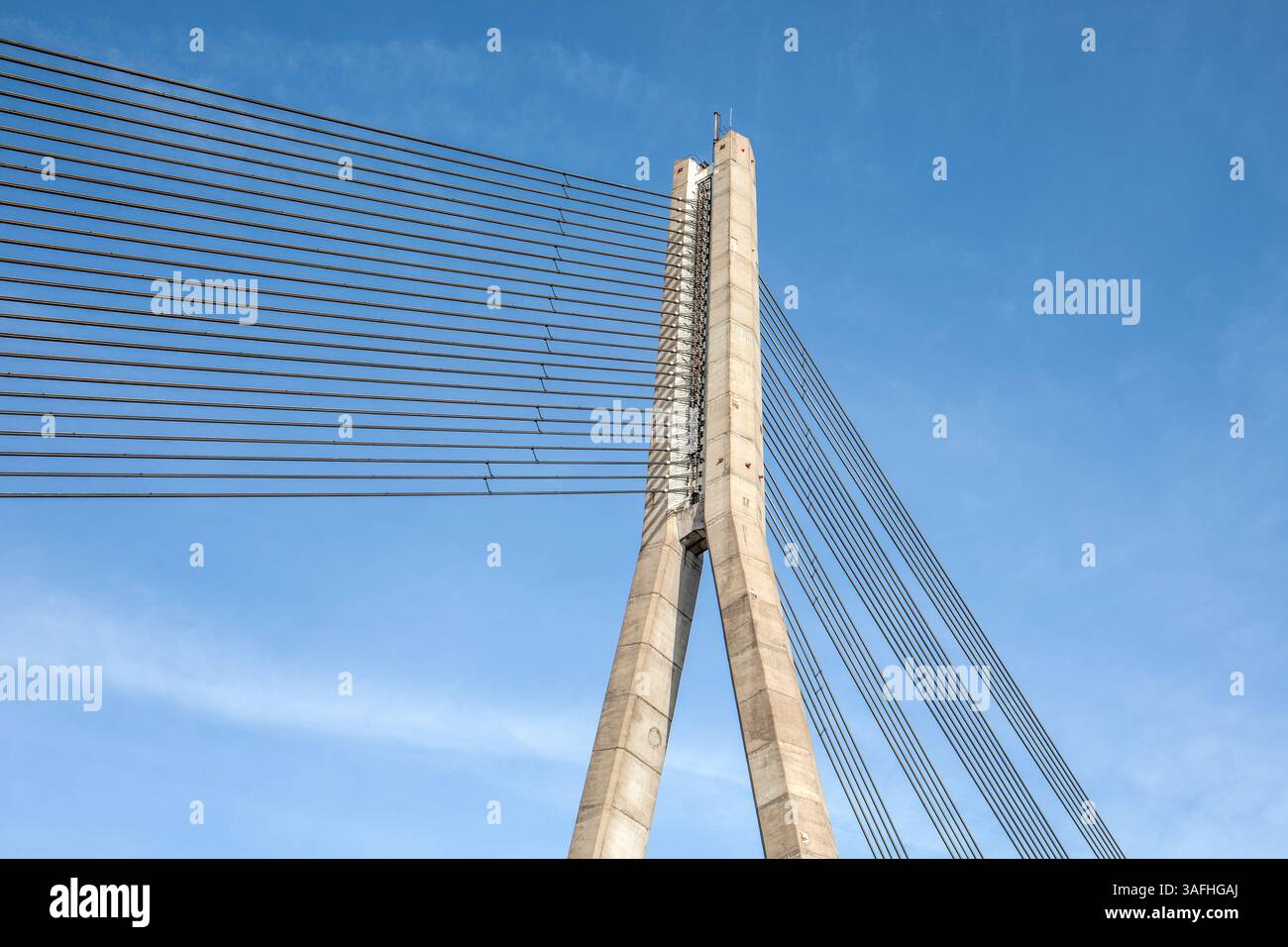 High Suspension Bridge Tower with Cables Against Clear Blue Sky Stock ...