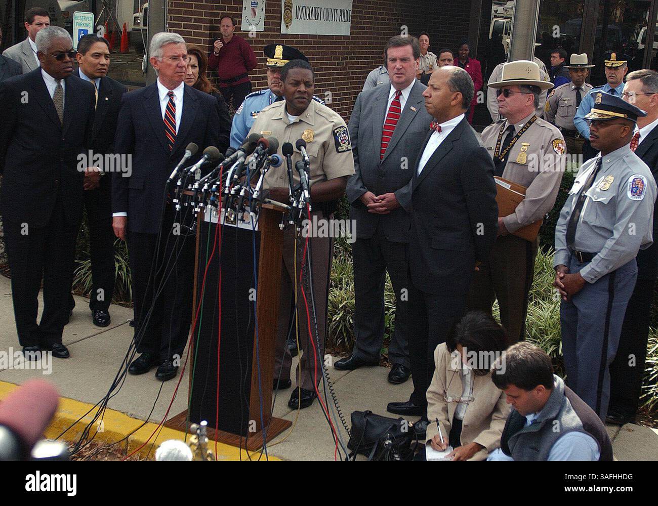 Montgomery County Police chief Charles Moose speaks at the podium as he ...