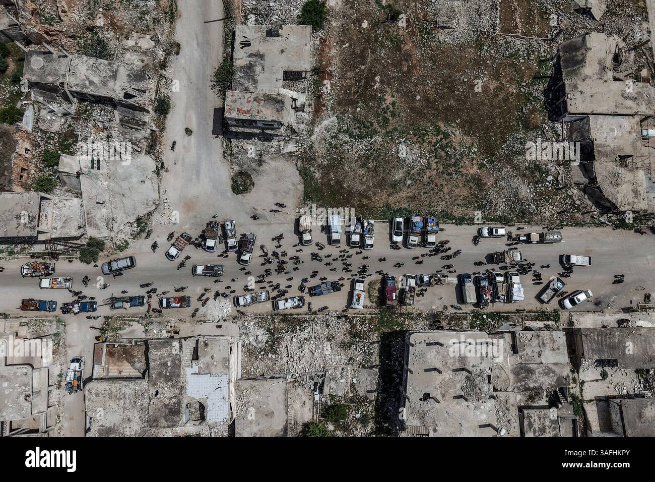 Idlib, Syria. 07th Apr, 2025. Displaced Syrian families form a return ...