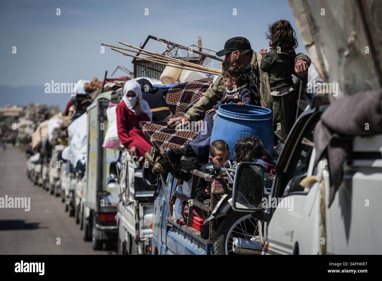 Idlib, Syria. 07th Apr, 2025. Displaced Syrian families form a return ...