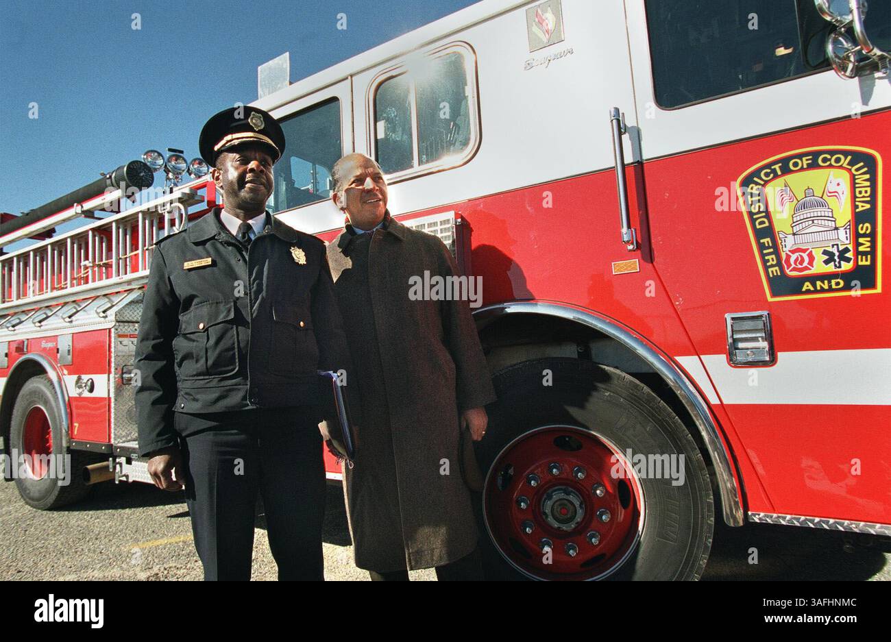 DC Fire Department Chief Adrian Thompson, left, and Mayor Anthony ...