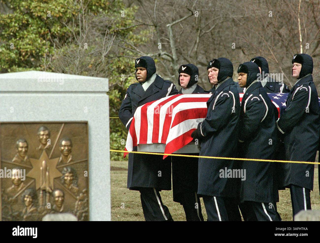 Air Force Honor Guard pallbearers carry the remains of Columbia ...