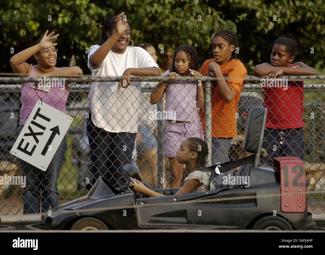 Family friends wave passing hi-res stock photography and images - Alamy