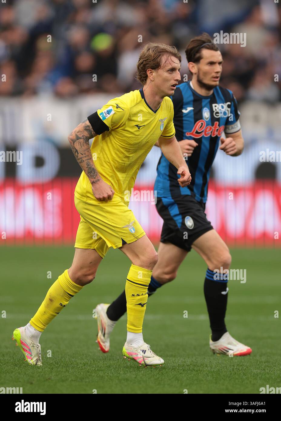 Bergamo, Italy, 6th April 2025. Nicolo Rovella of SS Lazio and Marten ...