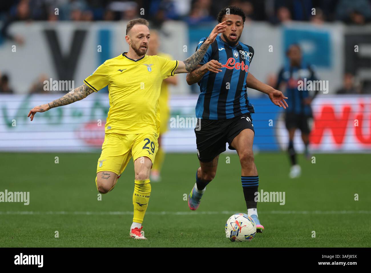 Bergamo, Italy. 6th Apr, 2025. Manuel Lazzari of SS Lazio is pursued by Ederson of Atalanta as ...