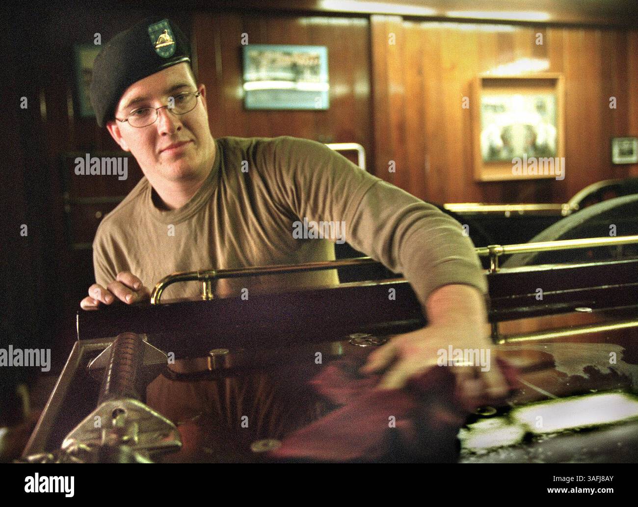 Spc. Zachariah Buchanan polishes the caisson inside the caisson room in ...