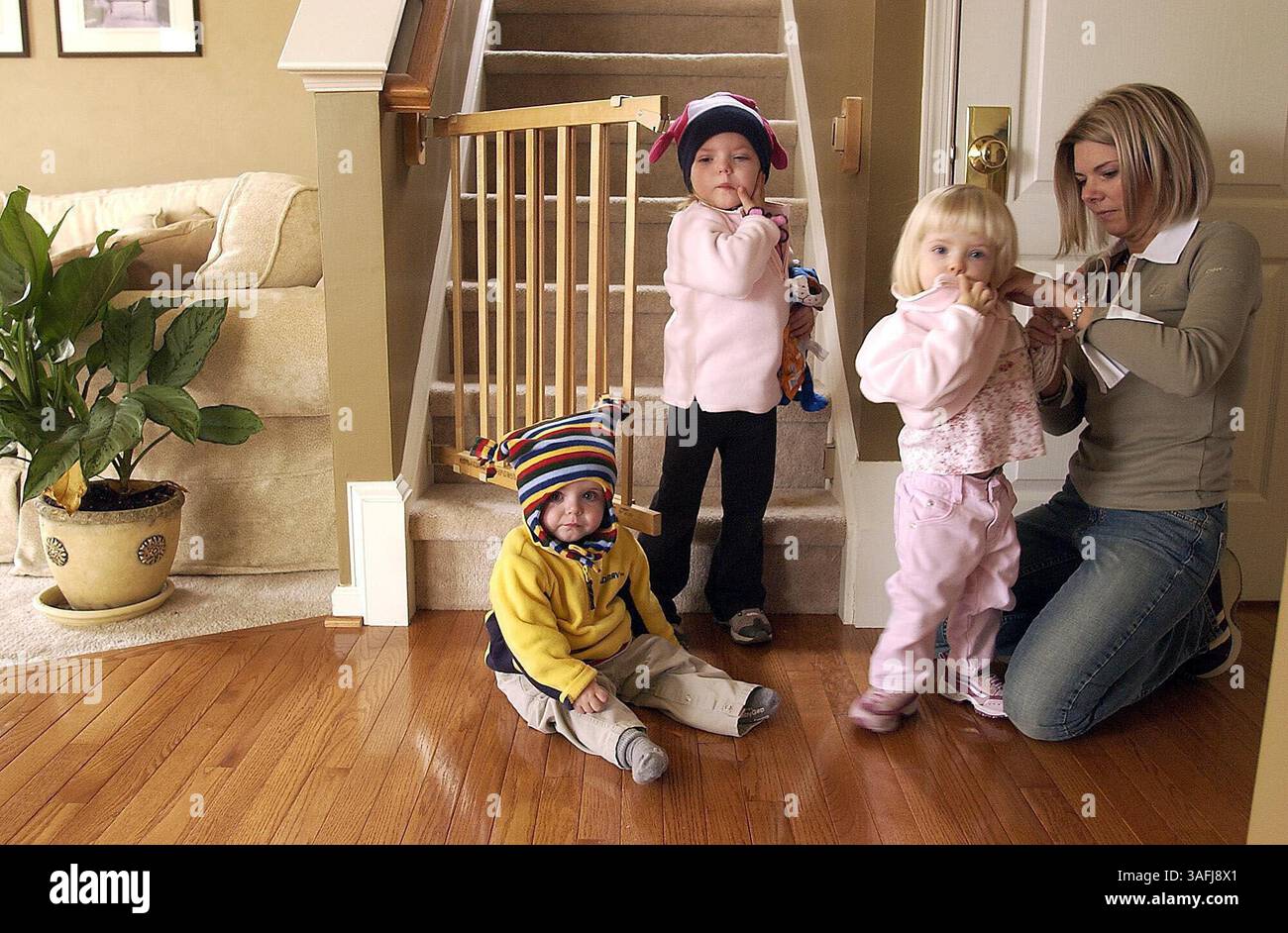 Lisa Kuipers has her hands full as she single-handedly readies her son ...