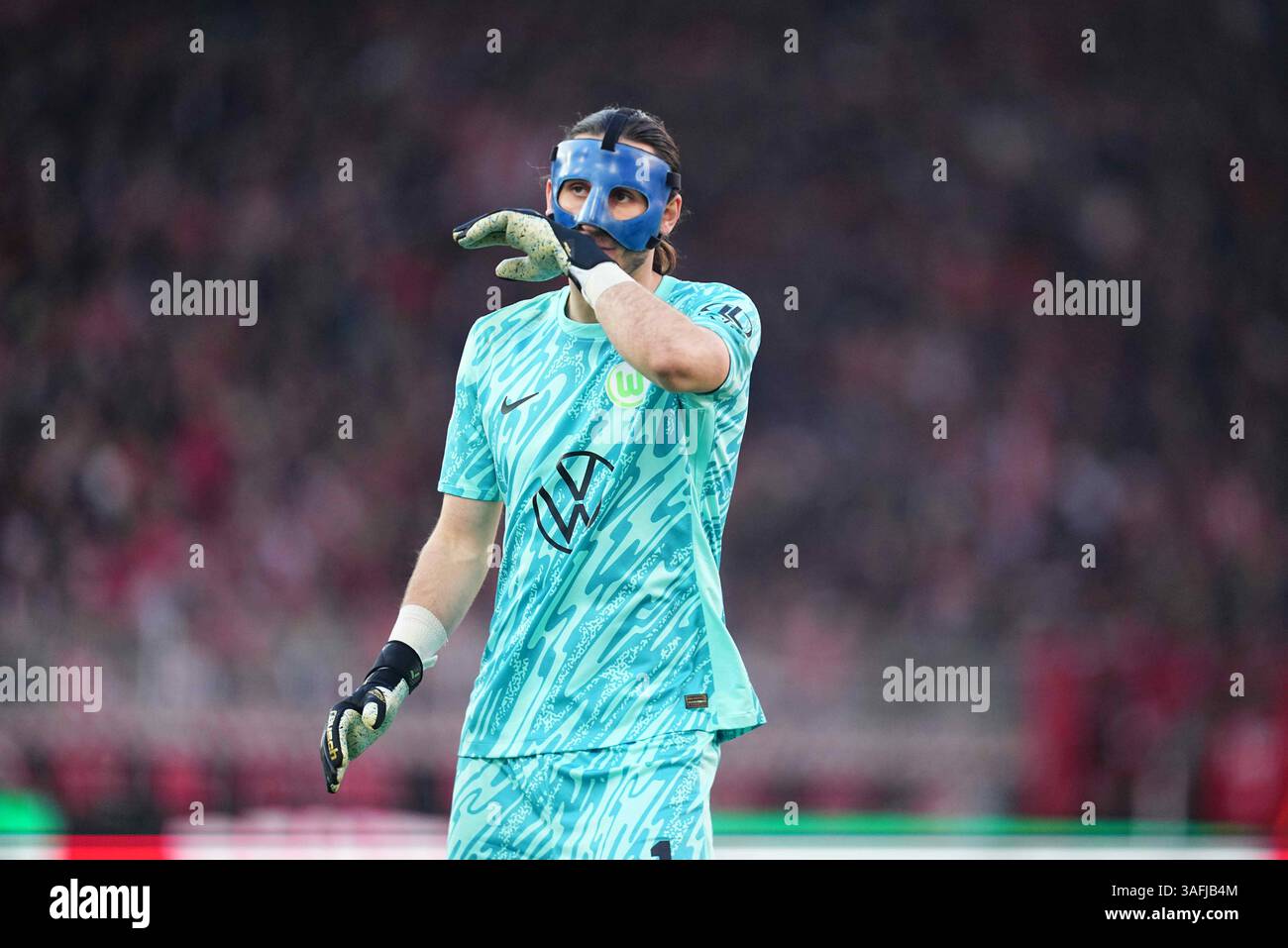 April 06 2025: Kamil Grabara of VfL Wolfsburg looks on during a 1 ...