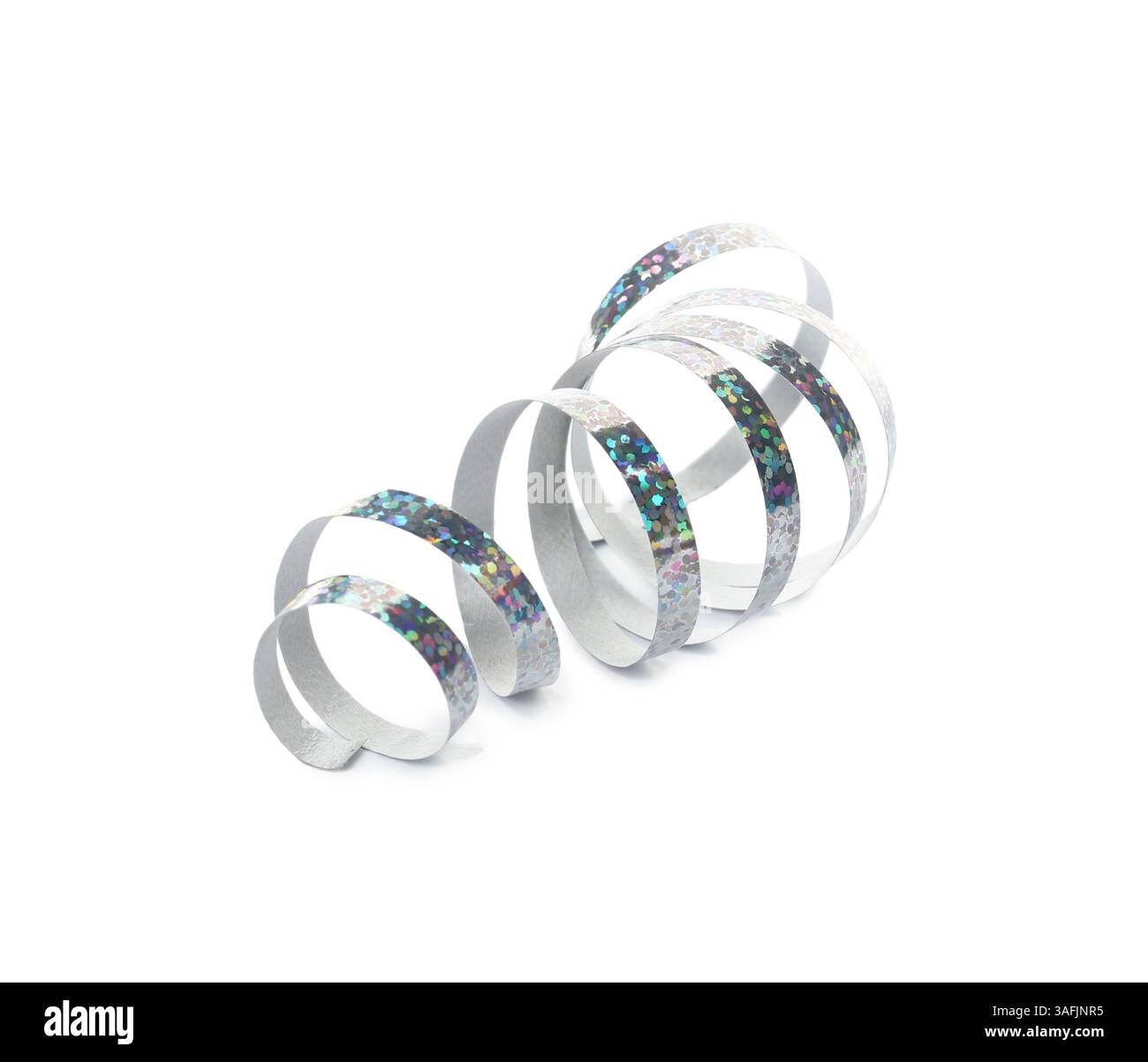 Shiny silver serpentine streamer on white background Stock Photo - Alamy