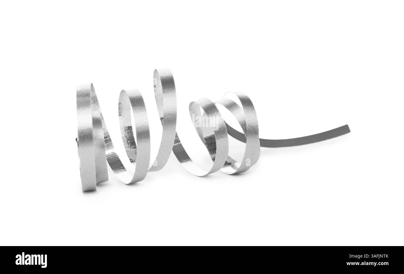 Shiny silver serpentine streamer on white background Stock Photo - Alamy