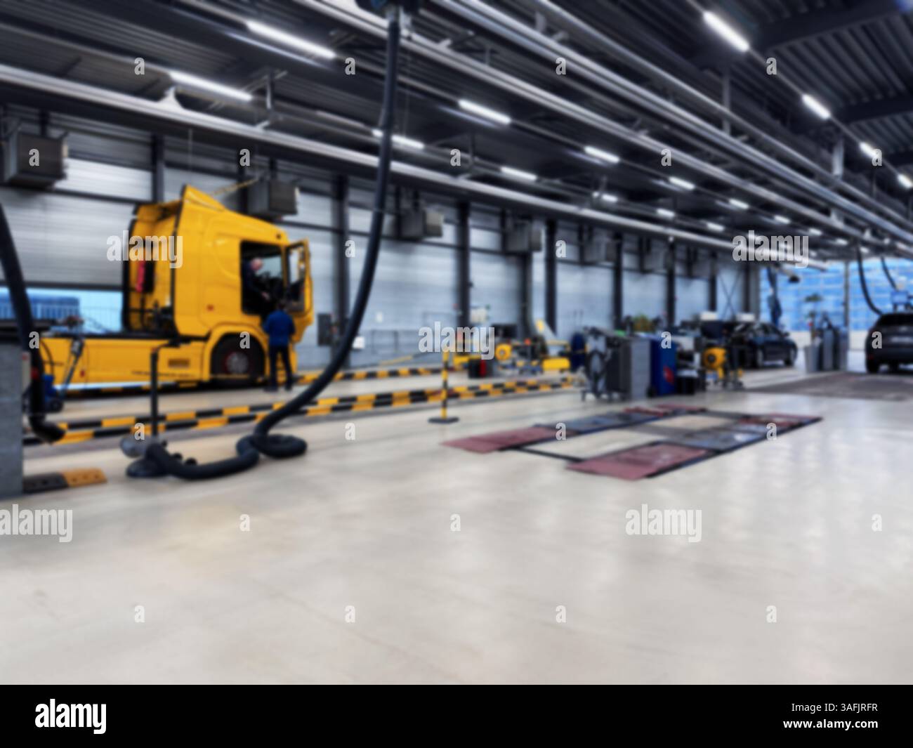 Different cars undergoing procedure of vehicle inspection at station ...