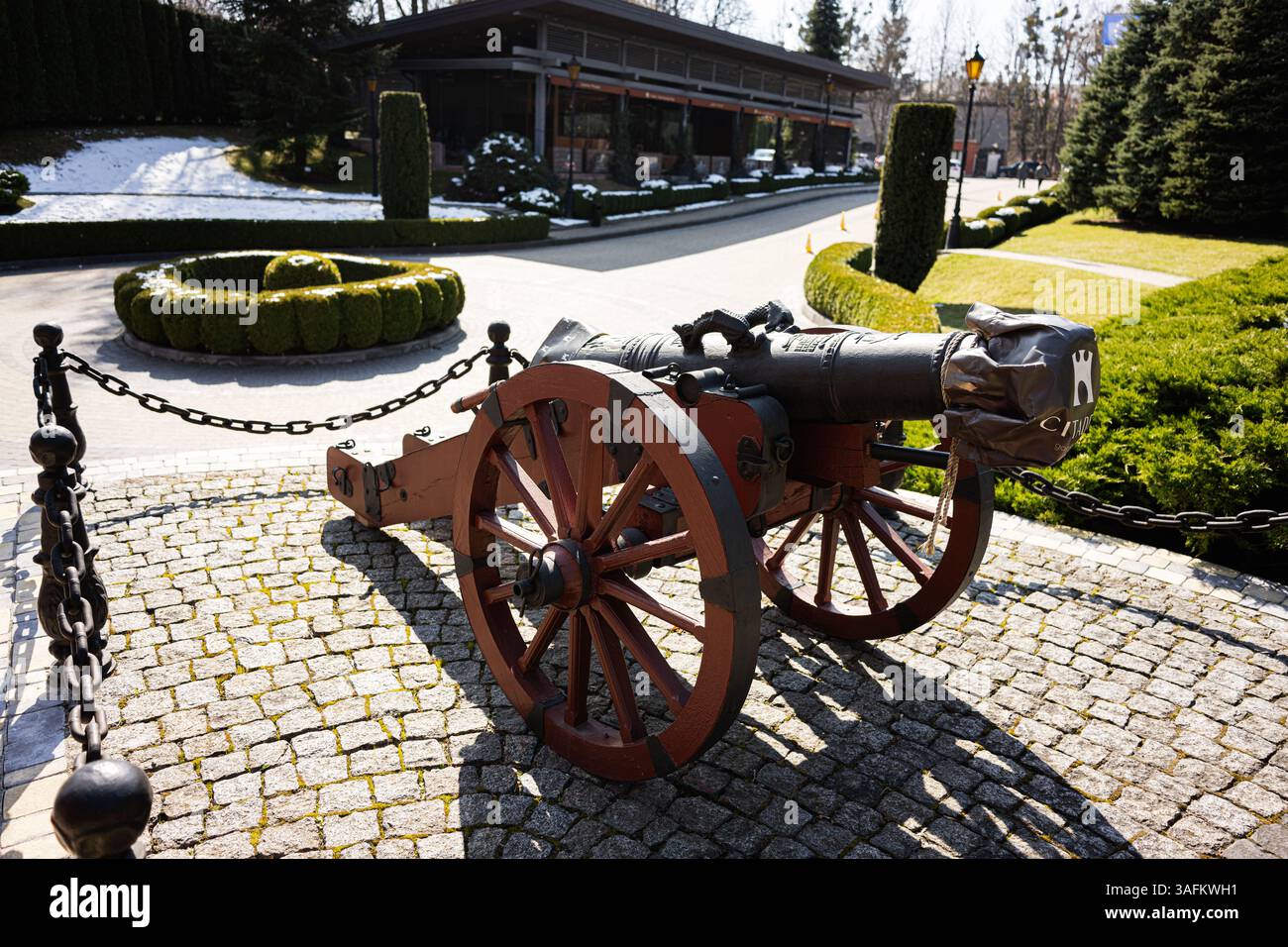 Lviv, Ukraine - April 06, 2025: Antique cannon set against a ...