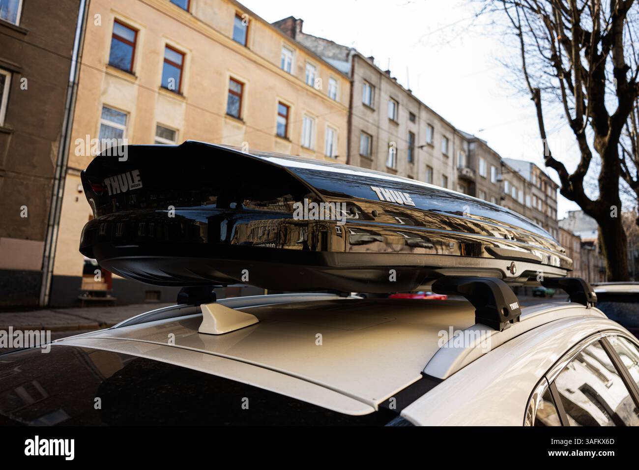 Lviv, Ukraine - April 06, 2025: Stylish Thule rooftop cargo box mounted ...