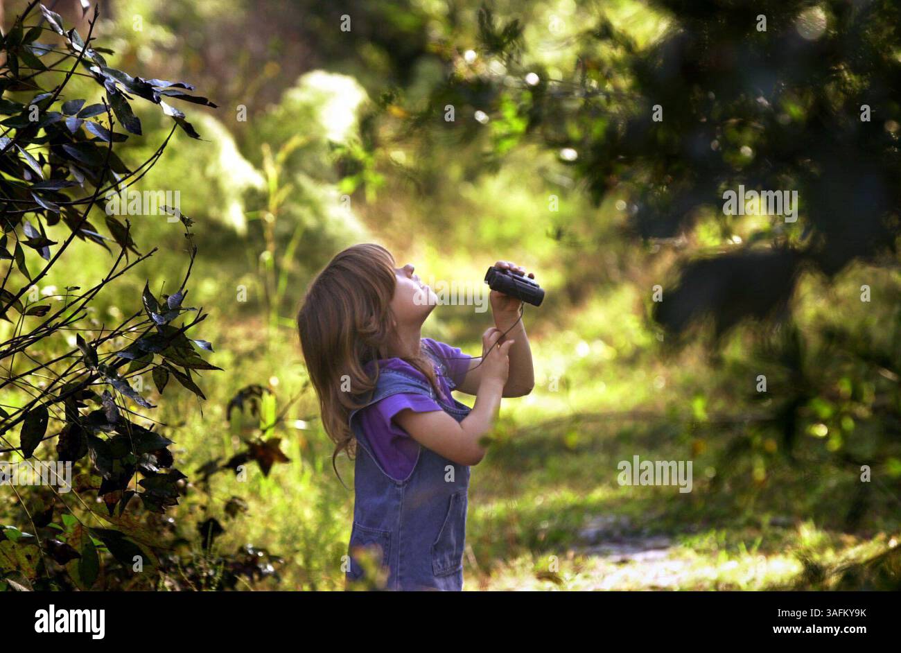 Elizabeth Rigsby, 6, cq, got a bit ahead of the group so she could spot ...