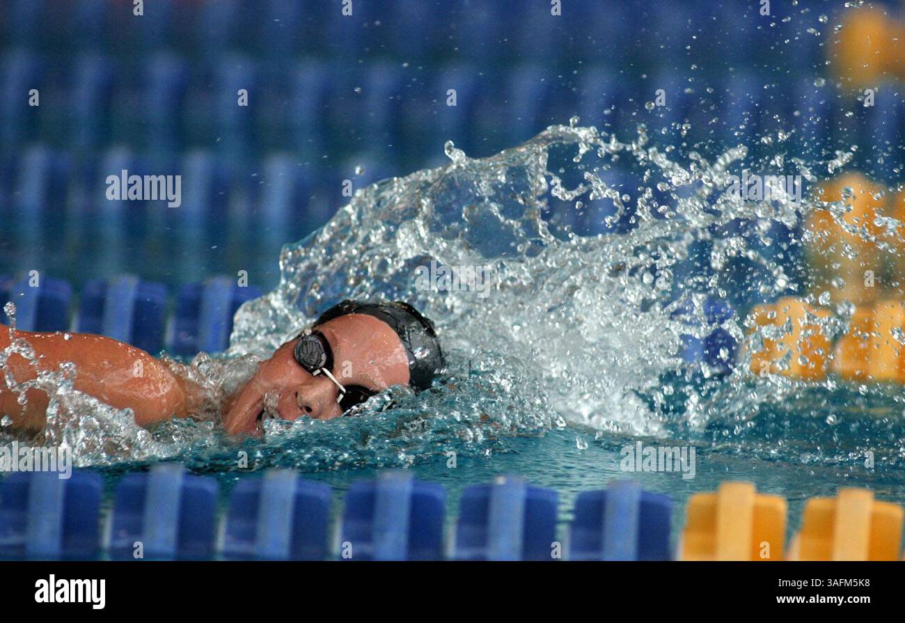 Olympic gold medalist Brooke Bennett swims the 800 meter freestyle in ...