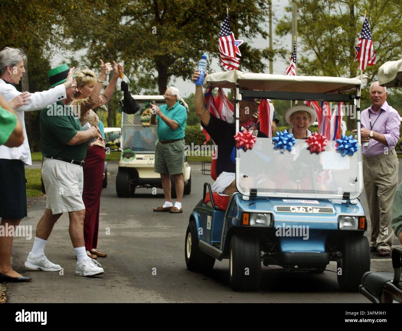 Golf carts on parking lot hi-res stock photography and images - Alamy