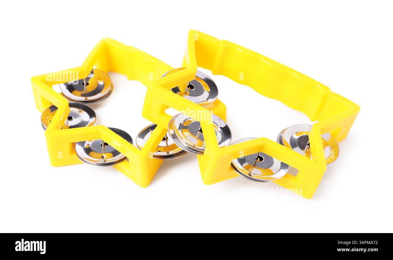 Yellow toy tambourines isolated on white. Child's musical instrument ...