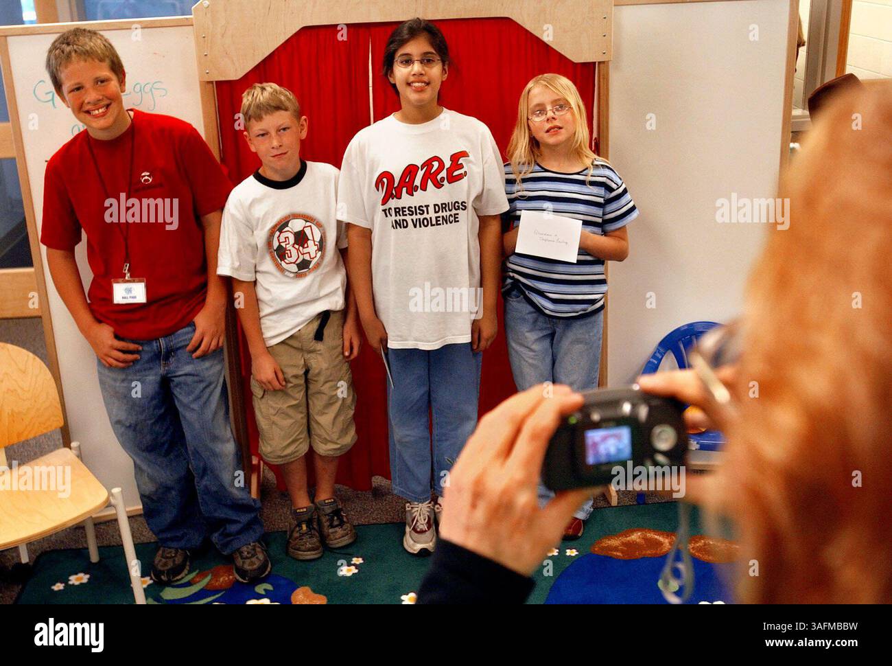 Sanderlin Elementary principal Denise Miller takes a photo of the ...