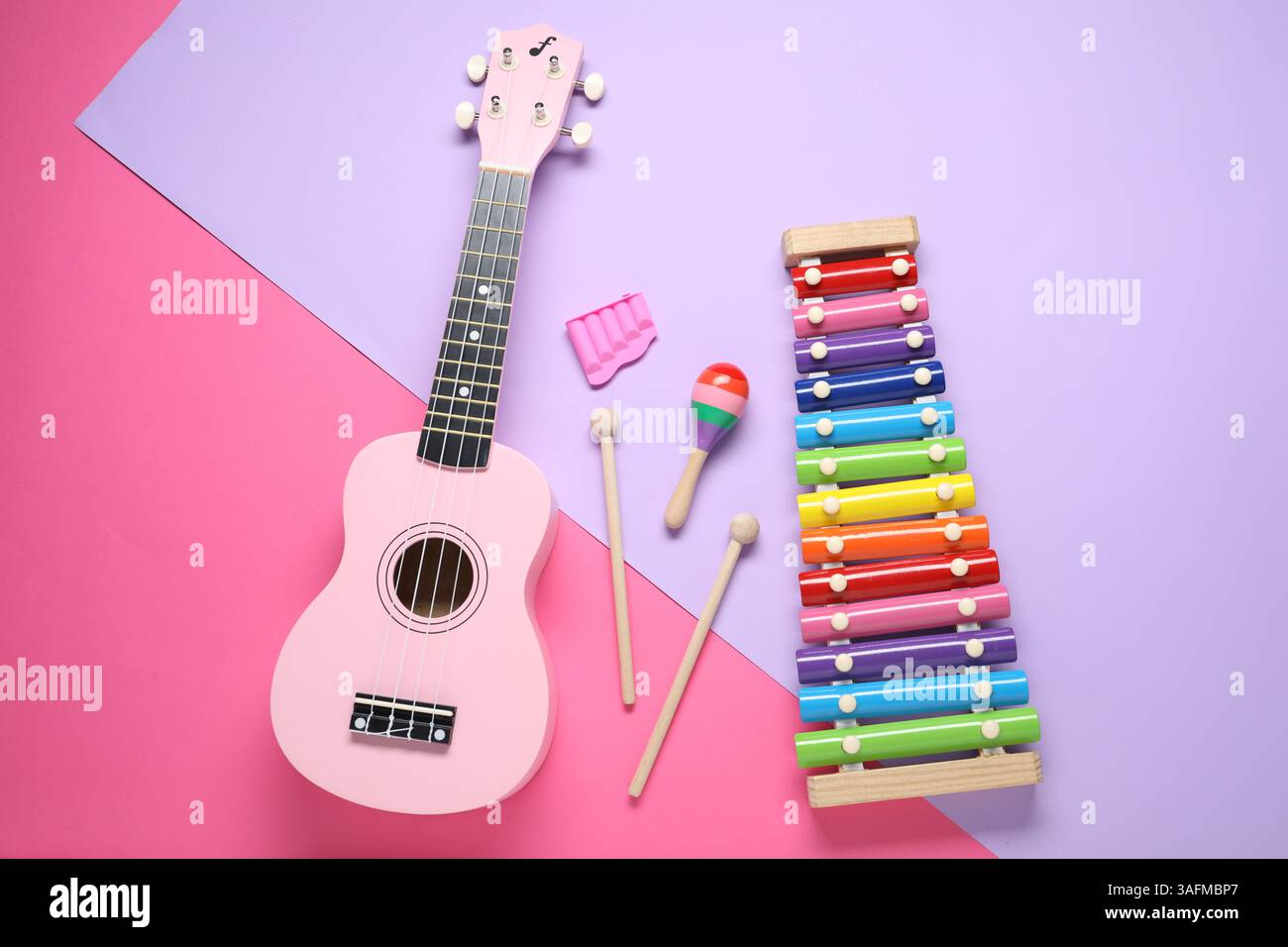Flat lay composition with different toy musical instruments on color ...