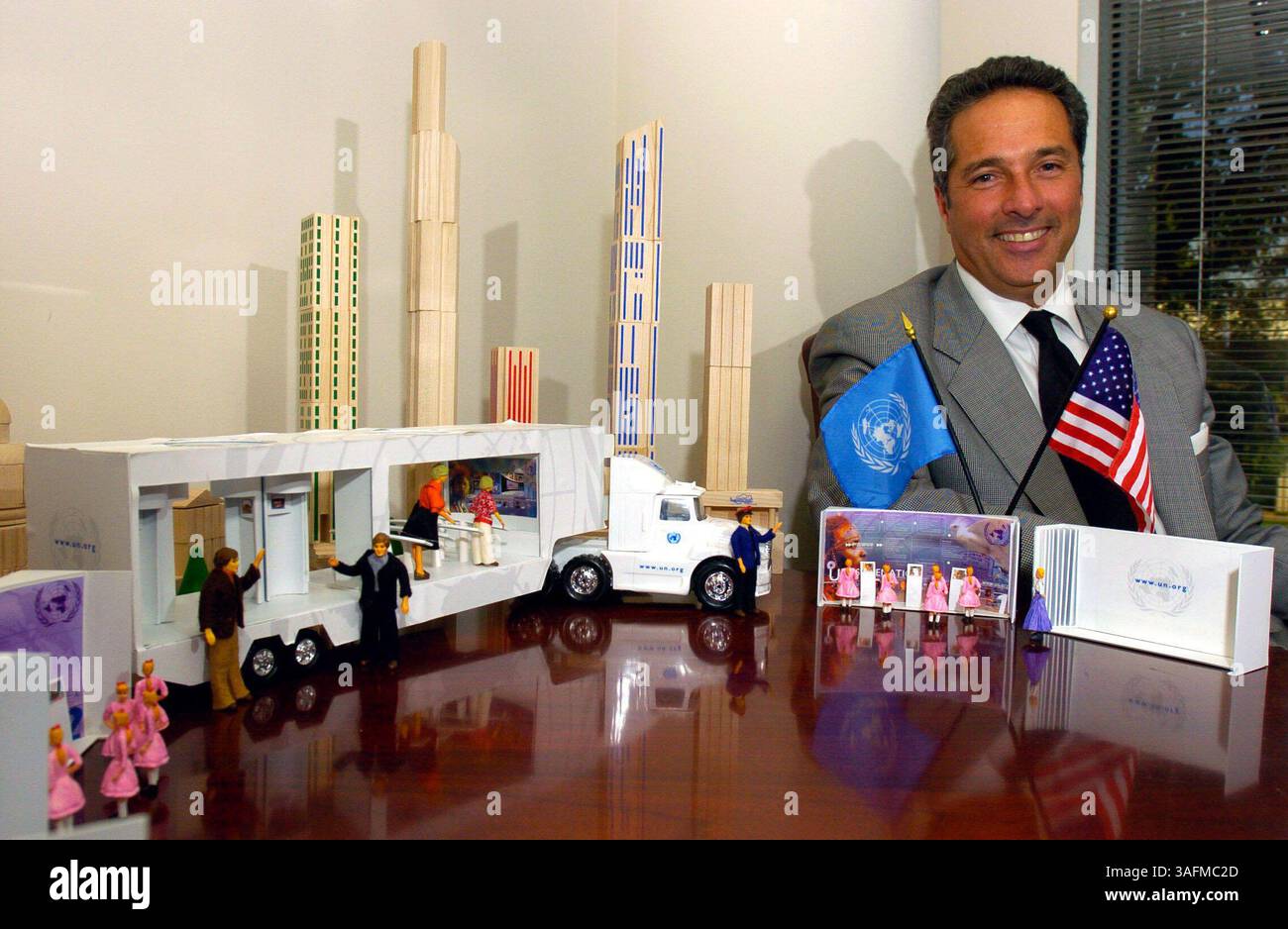 2) Malcolm Taaffe (cq) sits by his model of the traveling United ...