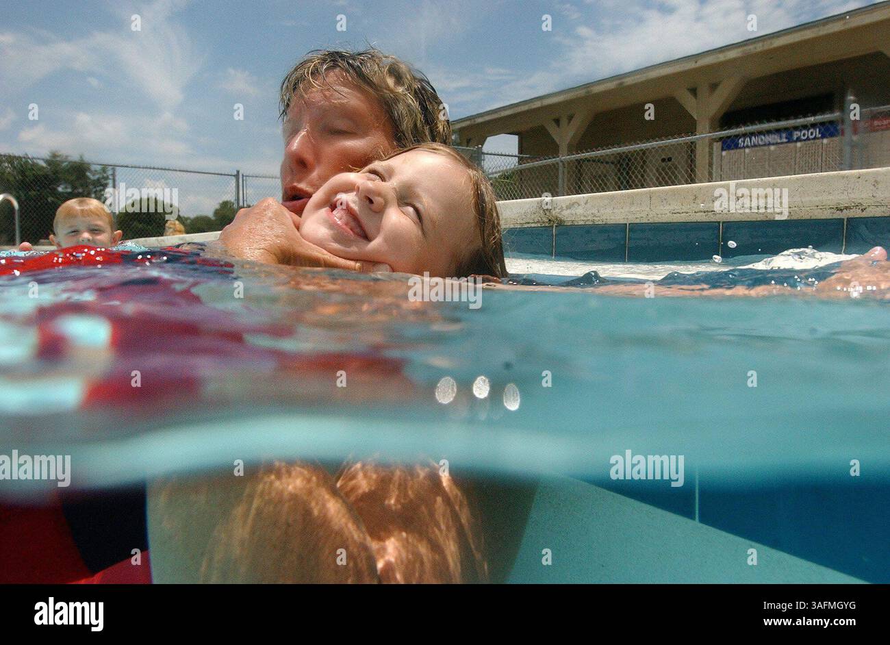 As she has just learned Samantha Cody , cq, 4, reaches for the wall ...