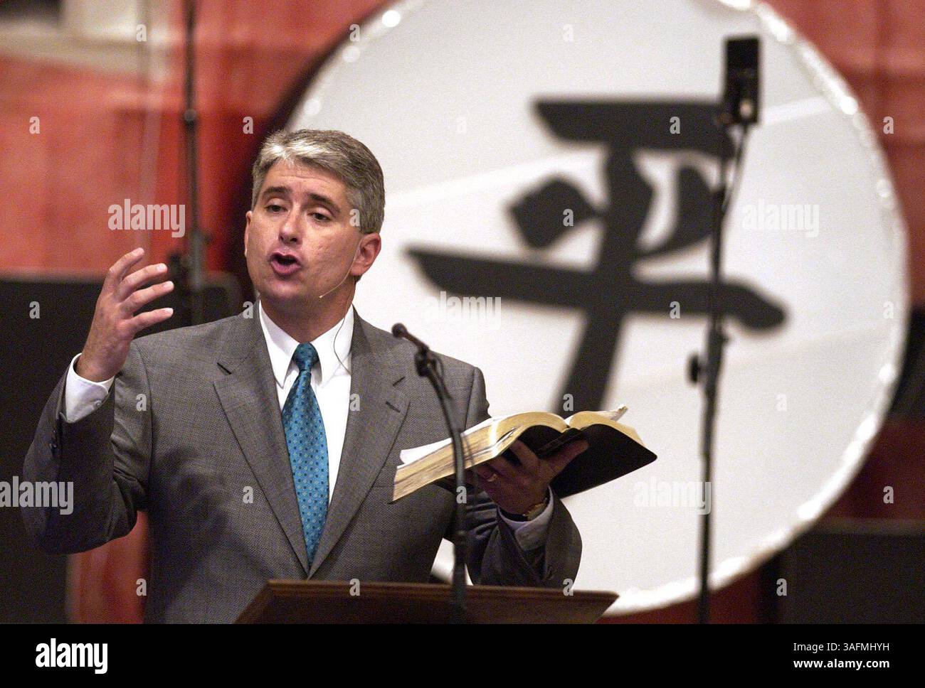 Photo 1 of 3. Pastor Ed Kuffel delivers a sermon at First Baptist ...