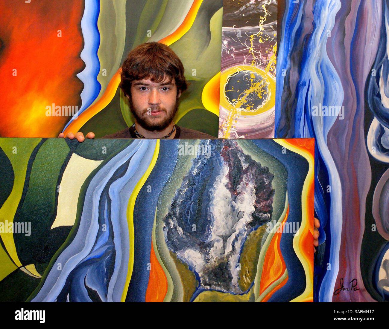 PHOTO 1/1: Artist Jon Poe, 18, recently graduated from Zephyrhills High ...