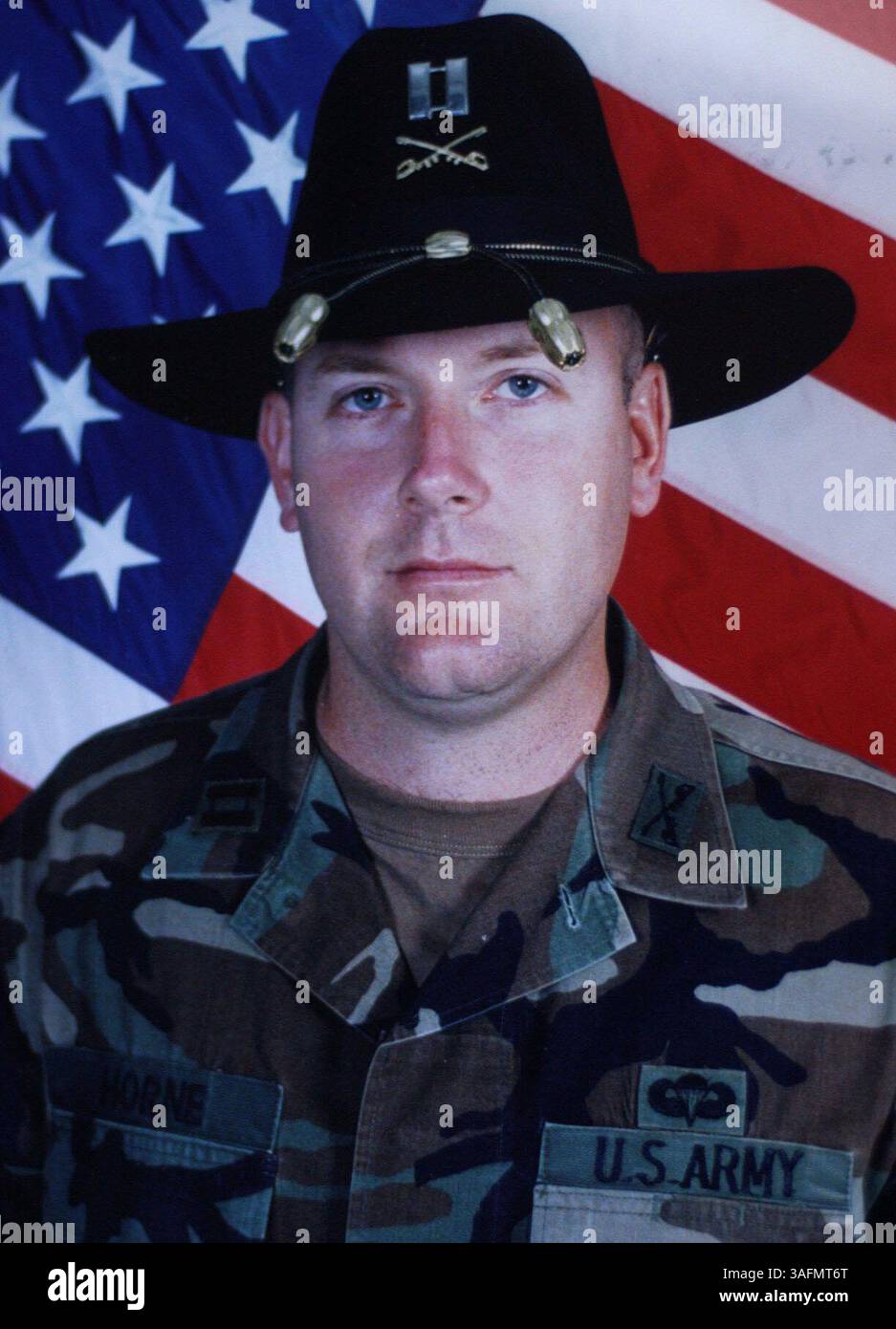 Caption: Army Captain Robert Horne (cq) is in Afghanistan. His wife ...