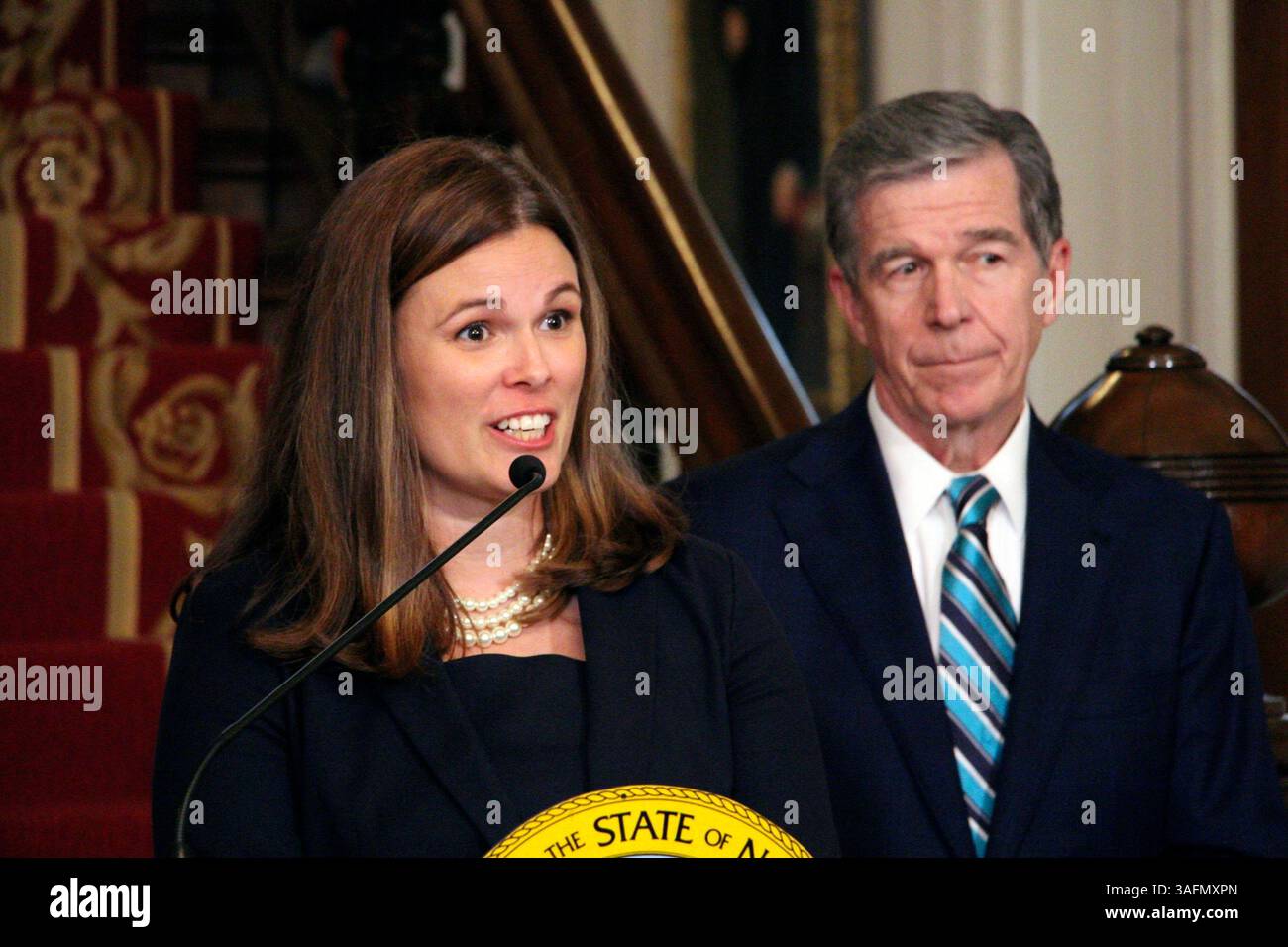 FILE - North Carolina Gov. Roy Cooper, right, appoints State Court of ...