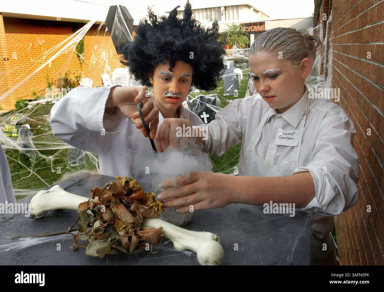 Albert Einstein protrayed by Sonia Pena (cq), 17, left and Charles ...