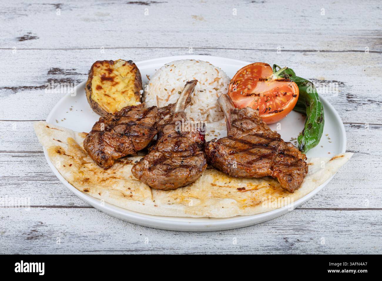 Grilled lamb chops in delicious view, Turkish name kuzu pirzola ...
