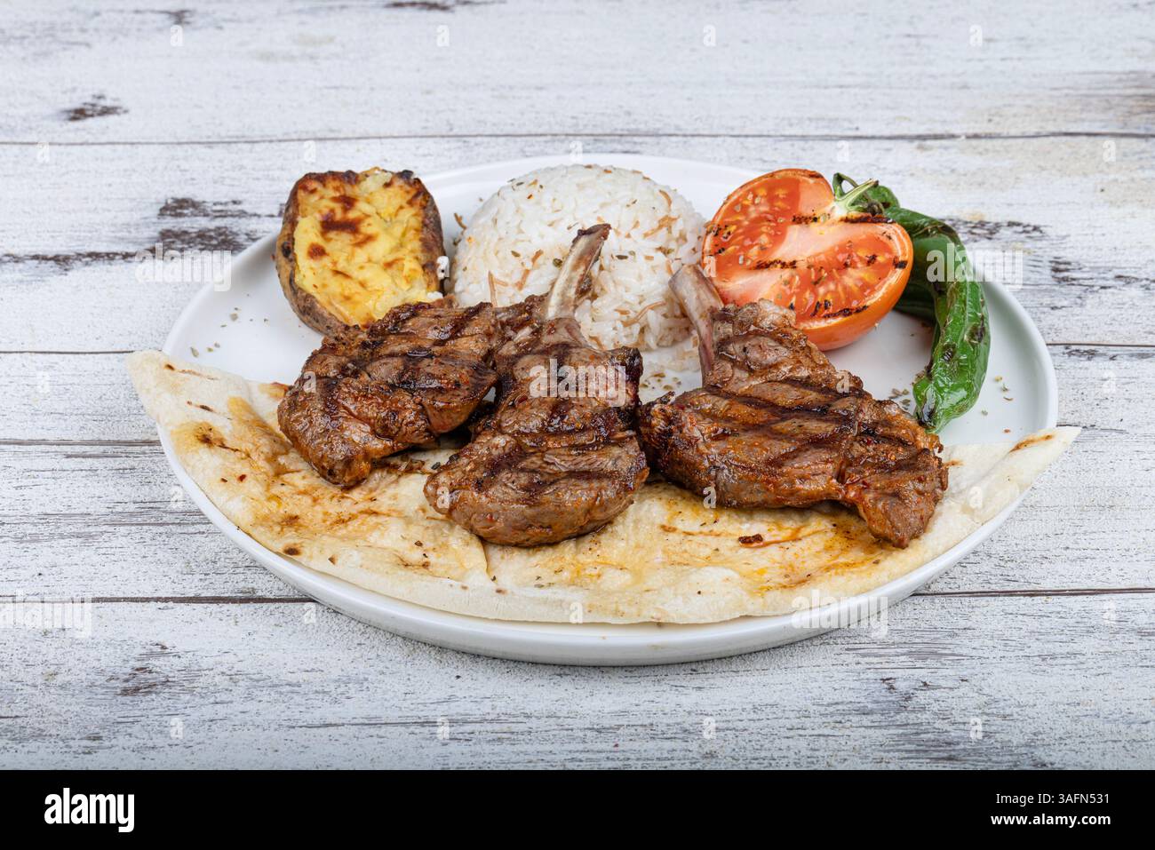 Grilled lamb chops in delicious view, Turkish name kuzu pirzola ...