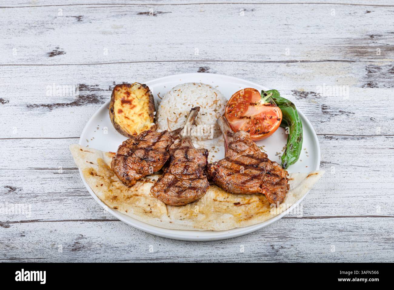 Grilled lamb chops in delicious view, Turkish name kuzu pirzola ...