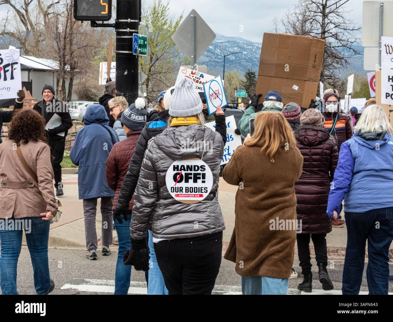 More than 1,000 people joined the "Hands Off" rally in Boulder ...